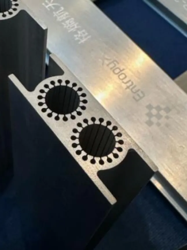 Customized Axially Grooved Heat Pipes for Efficient Cooling